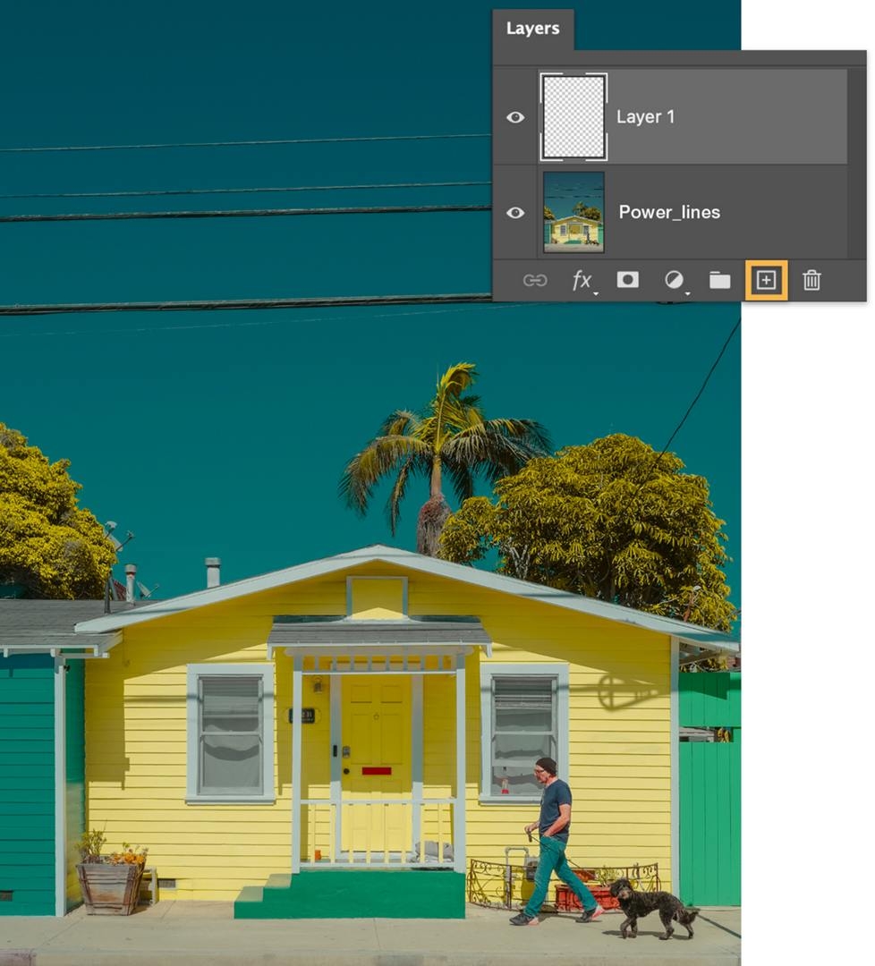 Remove power lines from street photography with Adobe Photoshop.